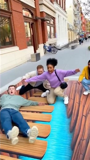 3d illusion makes them fall over #funny