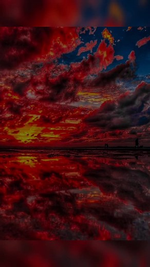 Stunning Red and Orange Sunset Reflections Over Water