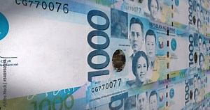 Creative 4k video of one thousand Philippines Pesos banknote moving details with close-up on the details of the Philippine banknotes. Slow motion of the money of Philippines. Detailed capture of Peso