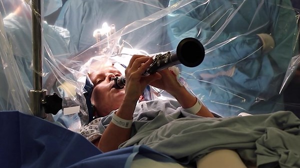 Parkinson's patient plays clarinet during brain surgery