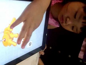 Steph playing First Words Sampler Apps on Ipad