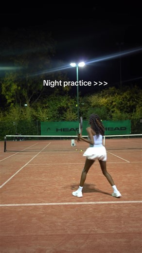 Tennis Girl's Night Practice on the Court