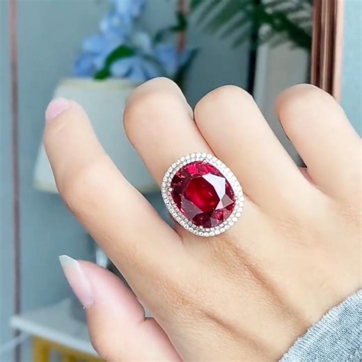 Must-See Red! Massive, vivid Red Tourmaline with a double diamond halo. The ultimate statement piece