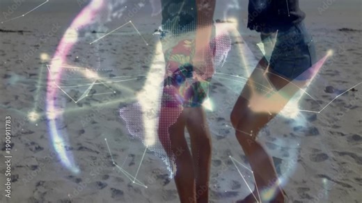 Man stepping on sand and sparking holo orb while woman playful mounting piggyback AR overlay fading