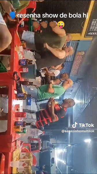 Nighttime Street Gathering: Socializing and Dancing