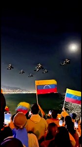 A breathtaking nighttime aerial display as multiple military helicopters perform coordinated maneuvers along the coastline. Flares illuminate the dark sky while the crowd watches in awe, capturing a powerful cinematic moment. Disclaimer: This video is a fictional simulation created solely for entertainment and cinematic visualization. No real combat, conflict, or military operation is shown. #USMilitary #HelicopterFormation #NightFlight #AerialDisplay #MilitarySimulation #CinematicVideo #Shorts 