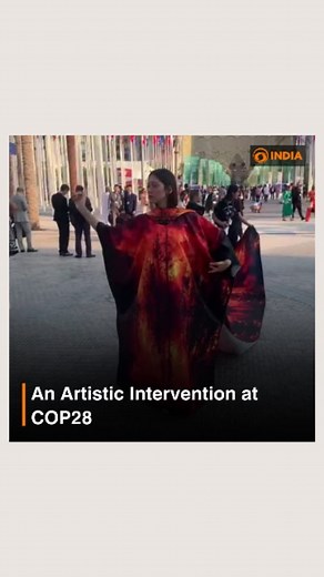 An artistic intervention at COP 28, drawing the connection between the combustion of fossil fuels and the forest fires around the world that they cause by Artivist network @artivistnet | DD India