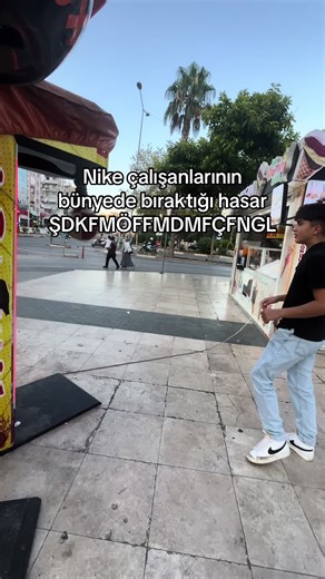 Young Man Challenges Punching Bag in Urban Setting