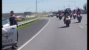 Video shows police officer apparently spraying mace at passing bikers on highway