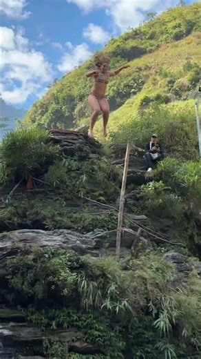 She Joins the Winter Waterfall Jump Festival — Bravery in the Cold #travel #waterfall