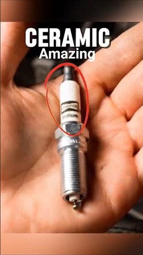 why does a spark plug break car window