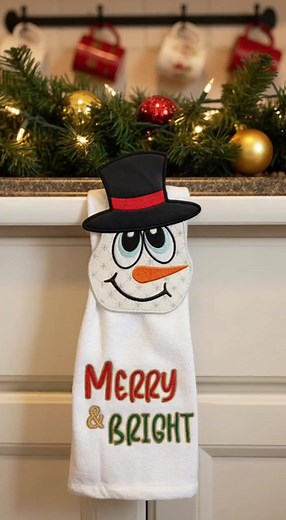 Add a touch of festive charm to your kitchen or bathroom with our ITH Snowman Hand Towel Holder. Designed to fit a 5x7 hoop, this delightful accessory is both functional and decorative, making it a perfect addition to your holiday decor. At just $4.99, it's an affordable way to bring a bit of winter magic into your home. Whether you're hosting guests or simply enjoying the season, this snowman towel holder is sure to bring a smile to everyone's face. This product exemplifies Embroidery Zone 2's 
