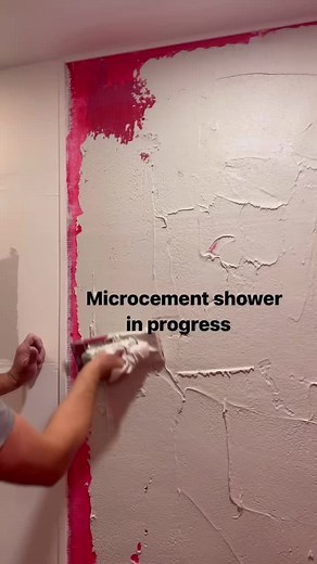 We are troweling on the product @surecreteproducts SureCrete Surespray on this shower. -The best way to apply it is either by troweling it on like we did, or spraying it on. - it is a great alternative to tiling your shower and looks modern and sleek - you can make it as smooth or as rough as you'd like - it needs two coats and this is our first coat - we ordered some color pigment packets in antique white and sun buff to test out some different colors follow along for part 2 to see the differen