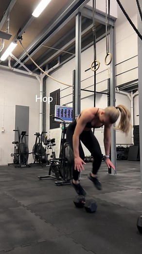 Challenging Burpees Over Dumbbell Workout