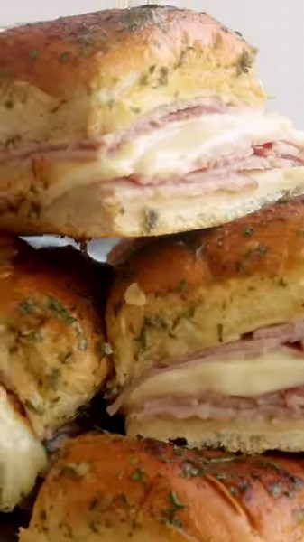 These Ham and Cheese Sliders make the perfect 25-minute appetizer or light dinner! | The Recipe Rebel