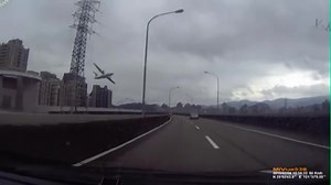 Dramatic video shows a TransAsia Airways flight clipping a bridge before it crashed into a river in Taiwan shortly after takeoff. http://fxn.ws/1uW365t (Video Credit: Facebook/Lin Ming-Huang) | Fox News