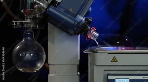 Rotary evaporator in the chemical, pharmaceutical and biotechnology industry. Separating the component substances from liquid mixture with evaporation and condensation in laboratory