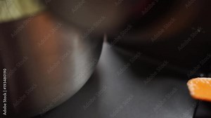 orange peel, silicone crock on baking form, kitchen machine mixing ingredients