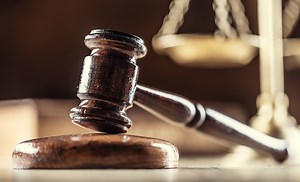 Oregon education worker wins partial victory in ‘He is He,’ ‘She is She’ book display case