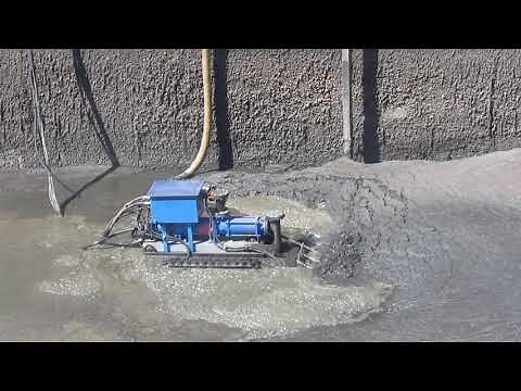 Industrial sludge pond cleaning - designed robotic system