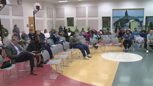 Dozens of parents rally to keep Louisa May Alcott Elementary open amid CMSD consolidation plan