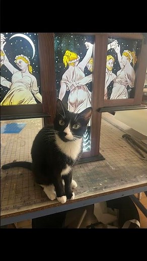 Finishing a triptych of illuminated glass paintings.