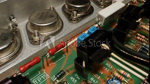 Radio parts of the old amplifier, vintage transistors and chips, hi-fi vintage audio player close up.