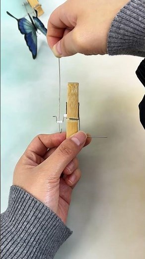 Teach how to make a flying butterfly with clips and paper clips!