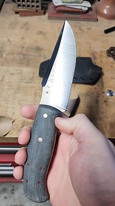 2.7K views · 113 reactions | Tradesman in Zapp Z 12 Ultra Made from 1/8" thick blade stock, 9.5" overall with a 4.68" blade, flat ground with a thin cutting edge, Black Canvas Micarta scales, Red G10 spacer, Bronze and Red G10 pins, comes with a secure Black Kydex sheath. SOLD Thanks for watching | Big Chris Custom Knives | Facebook