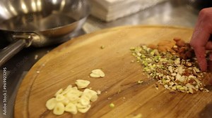 simmering vegetables, vegetable mixture, cooking process. Close-up pot filled with mixture vegetables, including tomatoes and leeks, simmering in flavorful sauce, cooking process.