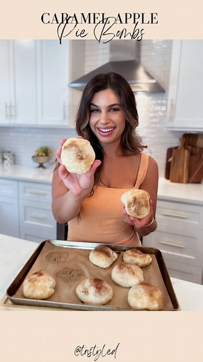 CARAMEL APPLE PIE BOMBS! Follow @tnstyled for more easy ideas! These came out soooo good I can’t wait to go apple picking and make homemade apple filling! I included the full recipe at the end of this video and below. Ingredients * ��1 can refrigerated biscuit dough * ��1 can apple pie fillings (you can also make this homemade) * ��16 caramel candies * ��Cinnamon sugar * 2 tbsp melted butter Directions 1. ���Preheat oven to 350 degrees and lay out parchment paper on a baking sheet 2. ���Remove b