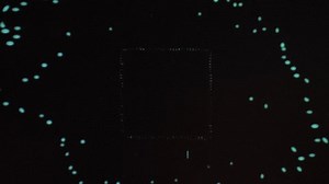 A human finger turns on the touch screen button and activates a futuristic artificial intelligence. Visualization of machine learning, artificial intelligence, computer technology connects with humani