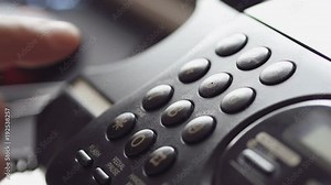 Men's Hand Dials On The Number Buttons On The Phone