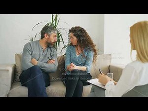 Married couple arguing and quarreling during visit professional psychologist and marriage counselor