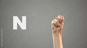 Letter N in sign language, hand on background, communication for deaf, lesson