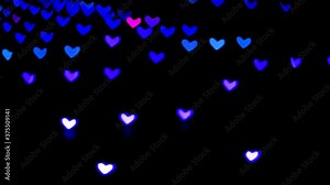 Blur and bokeh red heart shape change color on runway floor on night light of shopping mall