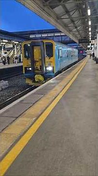 A Network Rail Inspection Train Class 153 (153385) travelling through Platform 1 at Exeter St Davids