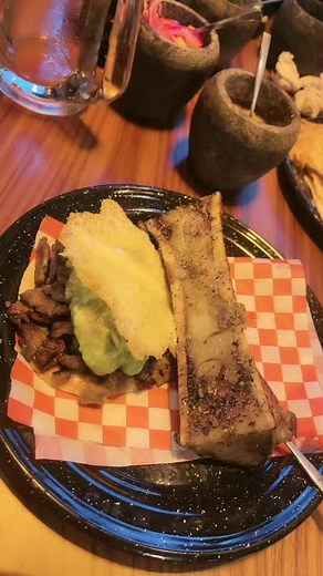 Savoring Grilled Meat with Bone Marrow and Avocado