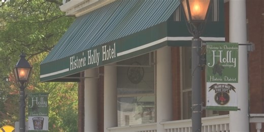 Holly Hotel reconstruction halted over property line dispute