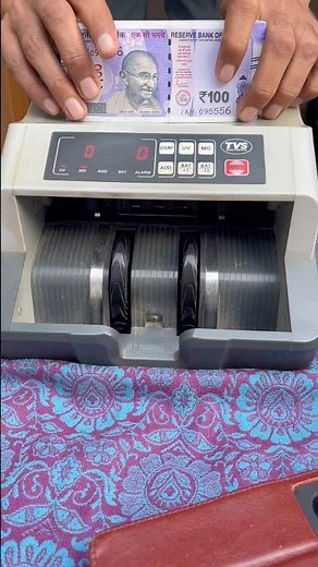 Counting 100-rupees cash 💴