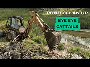 Backhoe in Action-Clearing Pond Weeds And Cattails Fast With A John Deere-#diyprojects