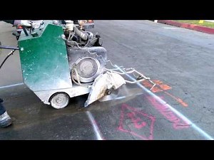 HTX1412 Cutting asphalt with 35HP flat saw