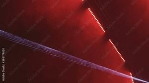 4k Laser Show in disco stage concert hall party music festival performance event. Laser rays are shine through the smoke. Shooted on Red Epic Dragon camera, slow motion. Party lights, laser lights.