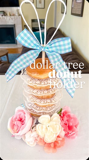Andrea Clawson on Instagram: "Dollar tree find: diy donut stack holder 🍩 🎀 🐰 made this using a wood base + a wood dowels from the @dollartree and just screwed them together! You can glue them together too but I wanted to be able to detach them for easy storing! When you see @stephaniehannahome share the cutest donut stack 🥰 you DIY your own! 🍩 Check out her page for all the cute festive ideas! Love how it turned out! So simple + easy 🎀 Would be cute to make as a hostess gift or a great way