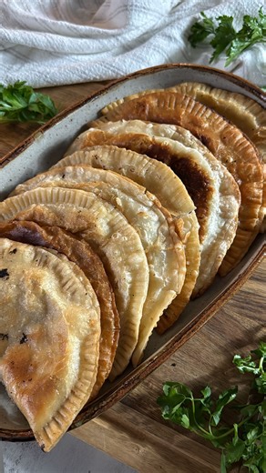 Dina Borshch | Easy Recipes & Weeknight Meals on Instagram: "These easy Chebureki (Fried Meat Pockets) are a shortcut version of a popular Slavic street food! No dough and no rolling, just uncooked tortillas, juicy meat filling, and a quick shallow fry. So good and super fast! What you’ll need: 16–18 uncooked tortillas 1 lb ground beef (85% lean) 1 lb ground chicken ¼ cup milk 1 large onion (grated) 2 tsp salt ½ tsp black pepper ¼ cup chopped parsley Oil for frying Instructions 1. Add the milk t
