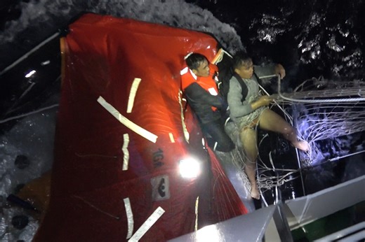 At least two dead after cargo ship capsizes in South China Sea