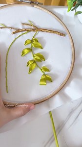Grosgrain ribbon brings these cascading petals to life | Asnimar Embroidery