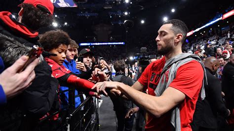 Zach LaVine Gifts Shoes To One Happy Fan NBA