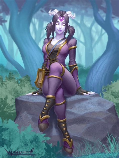 An Image Of A Woman Sitting On Top Of A Rock