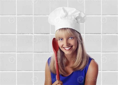 Young Smiling Blonde Chef With Her Colorful Spoon Posing On Neutral Background 45676856 Stock